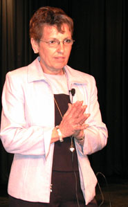 Speaker tries humor, wins standing ovation