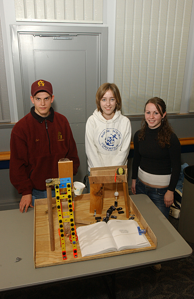 Engineering students demo Rube Goldberg devices