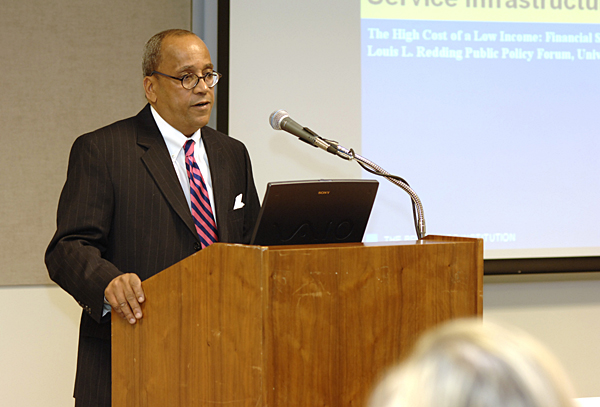 Forum spotlights high cost of low income