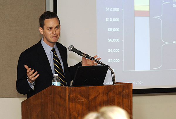 Forum spotlights high cost of low income
